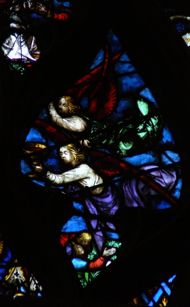 The west rose window depicting a scene from the Book of Revelation: Two ...