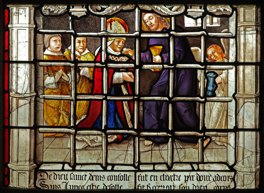 Window depicting a scene from the life of St Denis: receiving Communion ...