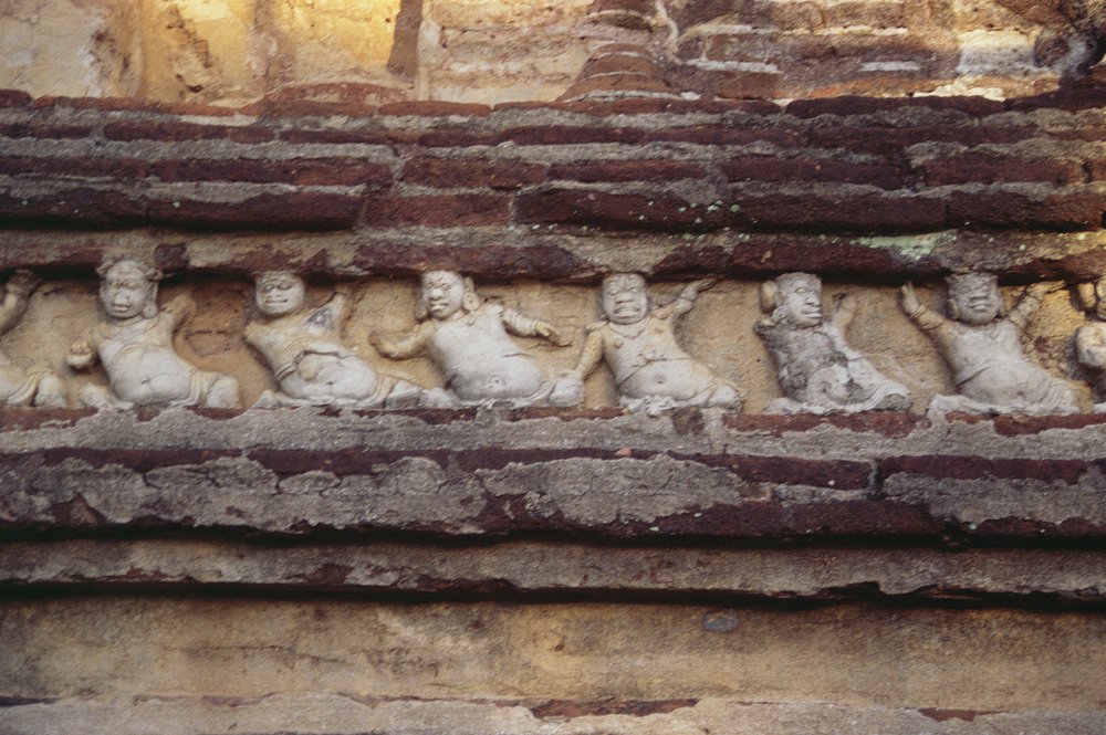 Relief depicting dwarves on the exterior of the Thivanka Image House