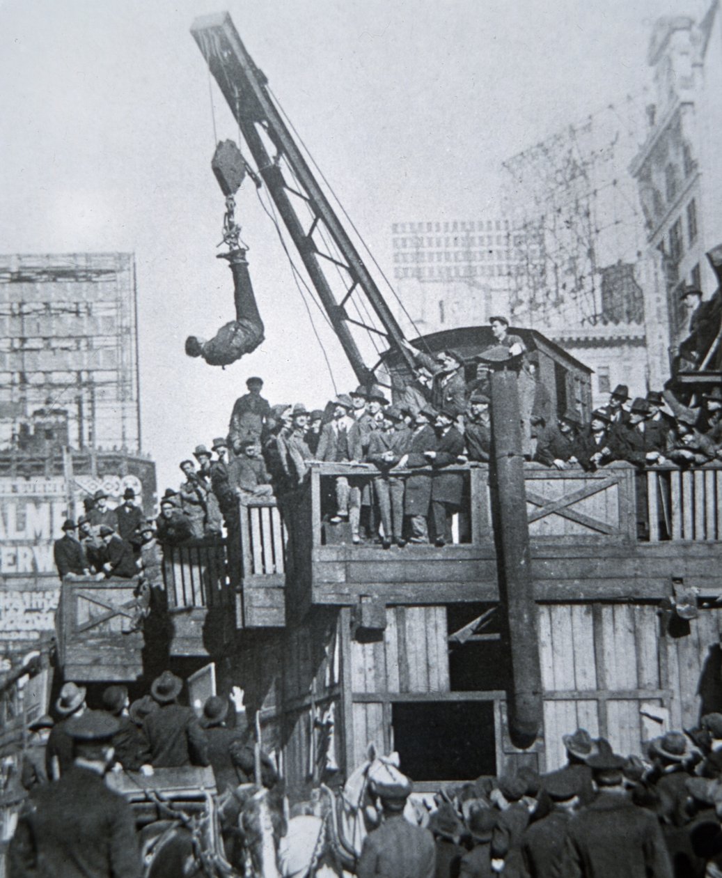 Houdini Escaping from a Strait-Jacket While Suspended from a Crane in ...