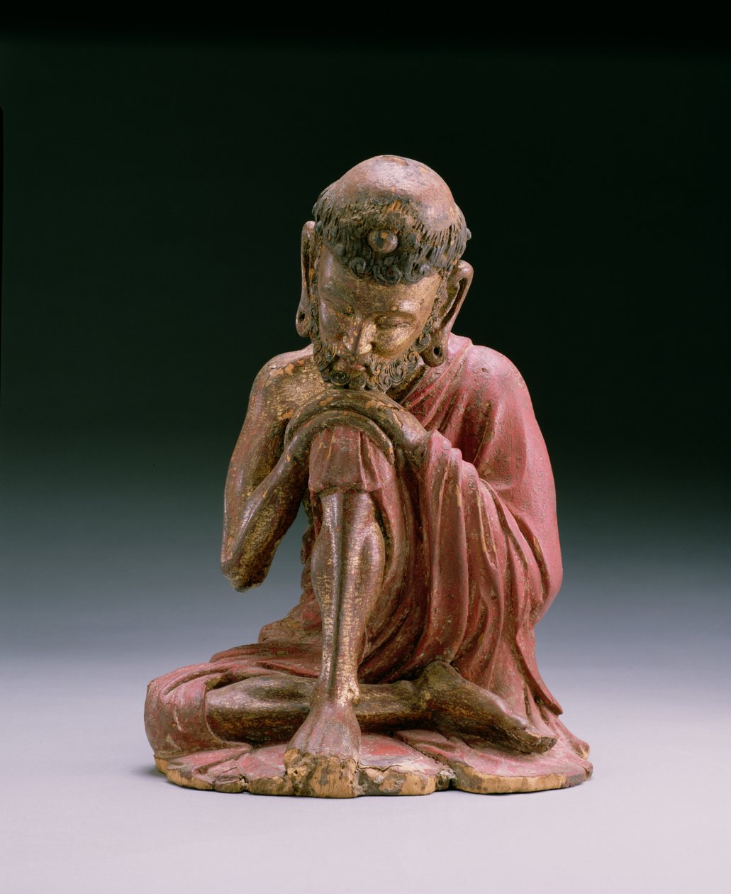 Red lacquer figure of Sakyamuni, the founder of the Buddhist faith ...