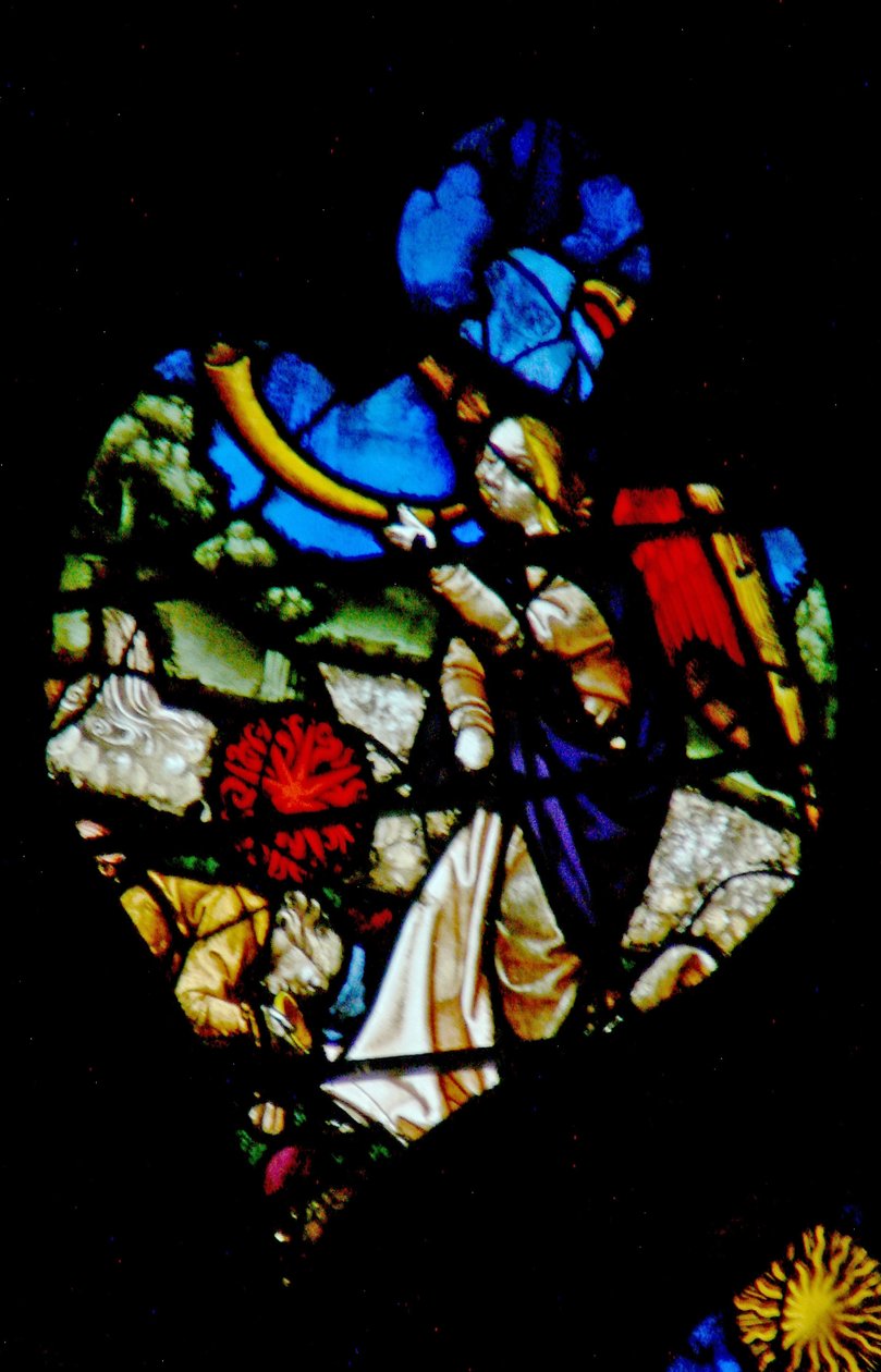 The west rose window depicting a scene from the Book of Revelation ...