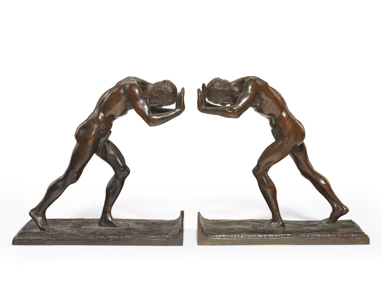 Pushing Men, a pair of bookends by Isidore Konti