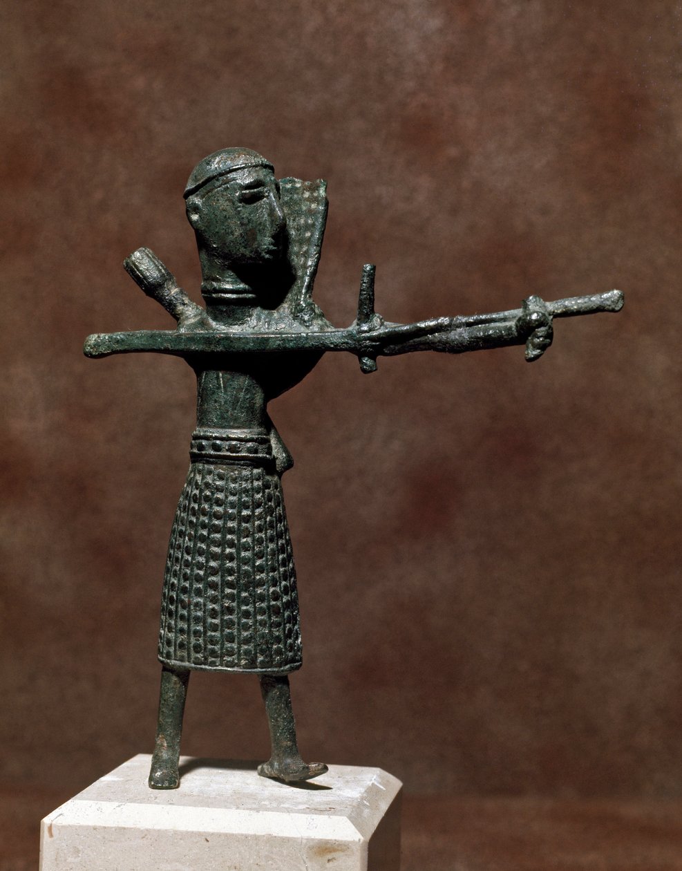 Statuette of warrior wearing an oriental bronze skirt. 8th-7th century ...