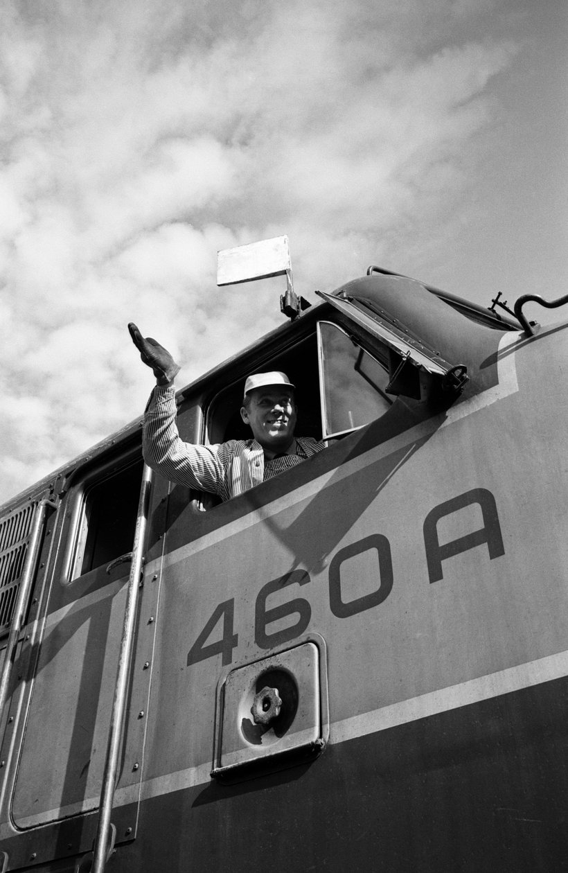 Engineer of the Great Northern Railroad Waves from Cab of EMD E7 Locomotive